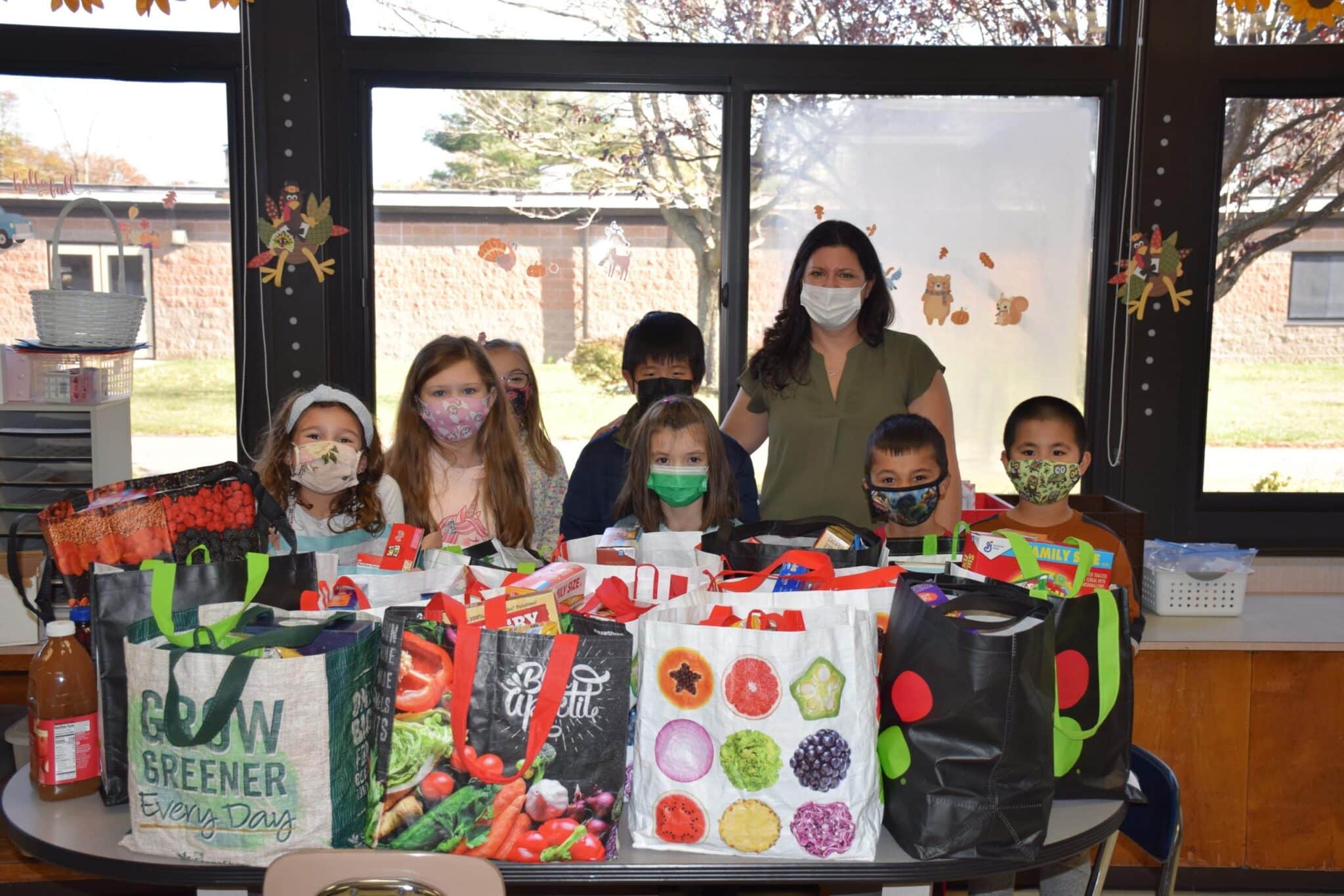 Local giving through elementary school’s annual food drive | Team Up 4 ...