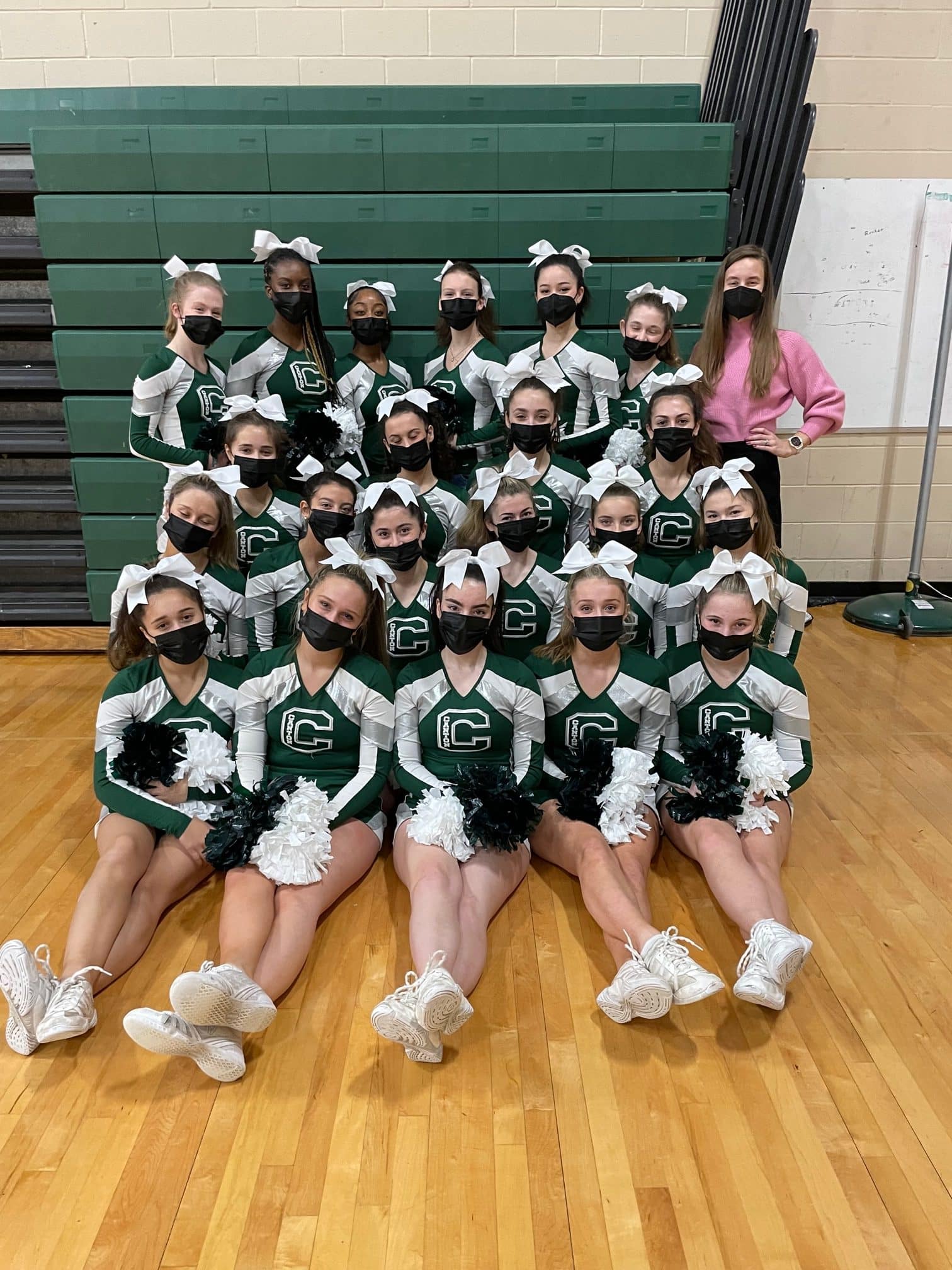 Canton Varsity cheerleading team along with the boys basketball team ...