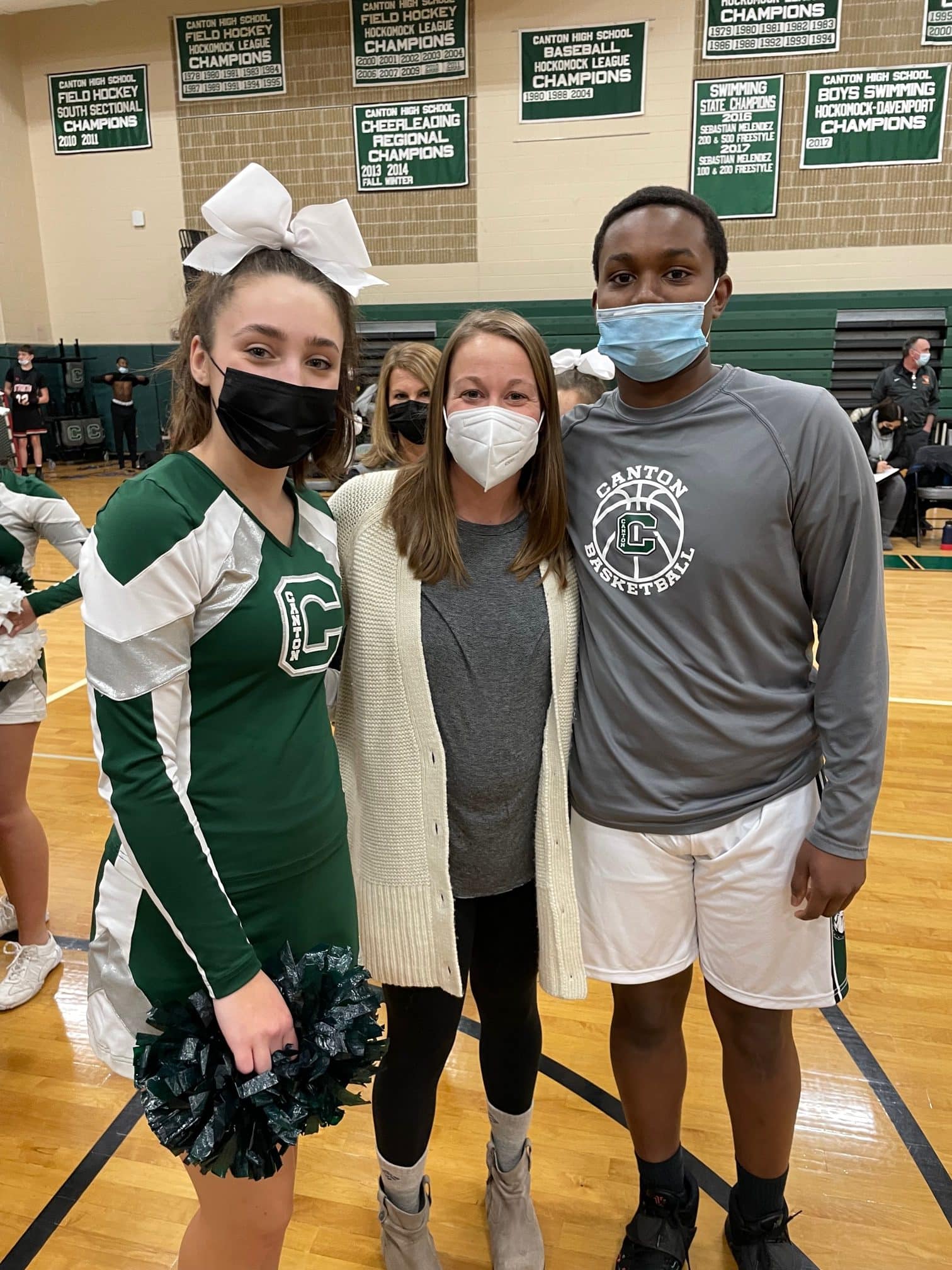 Canton Varsity cheerleading team along with the boys basketball team ...