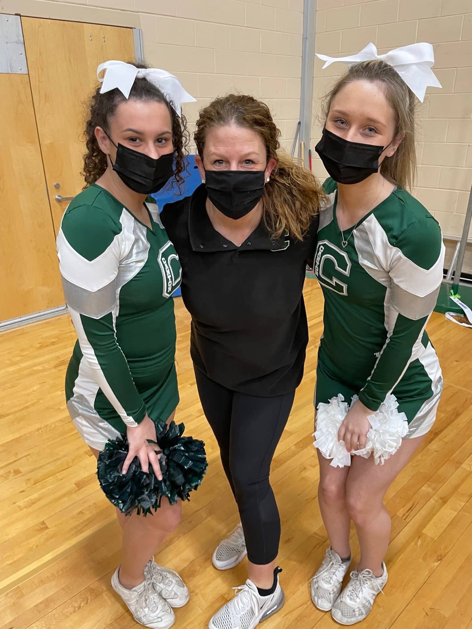 Canton Varsity cheerleading team along with the boys basketball team ...