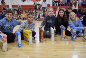 Cereal Box Domino Challenge knocks down hunger | Team Up 4 Community