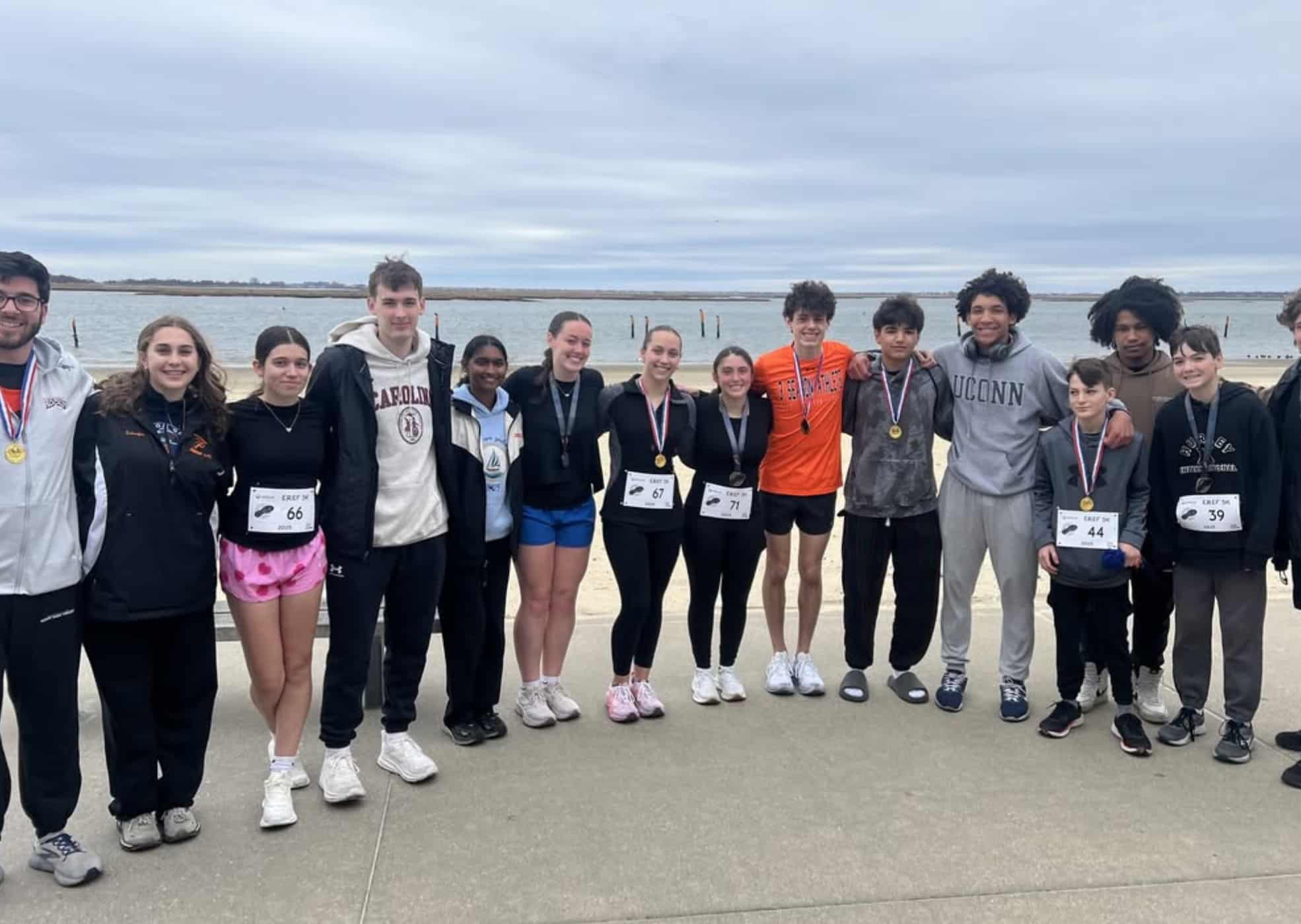 East Rockaway Track Teams Go the Extra Mile for Their Community | Team ...