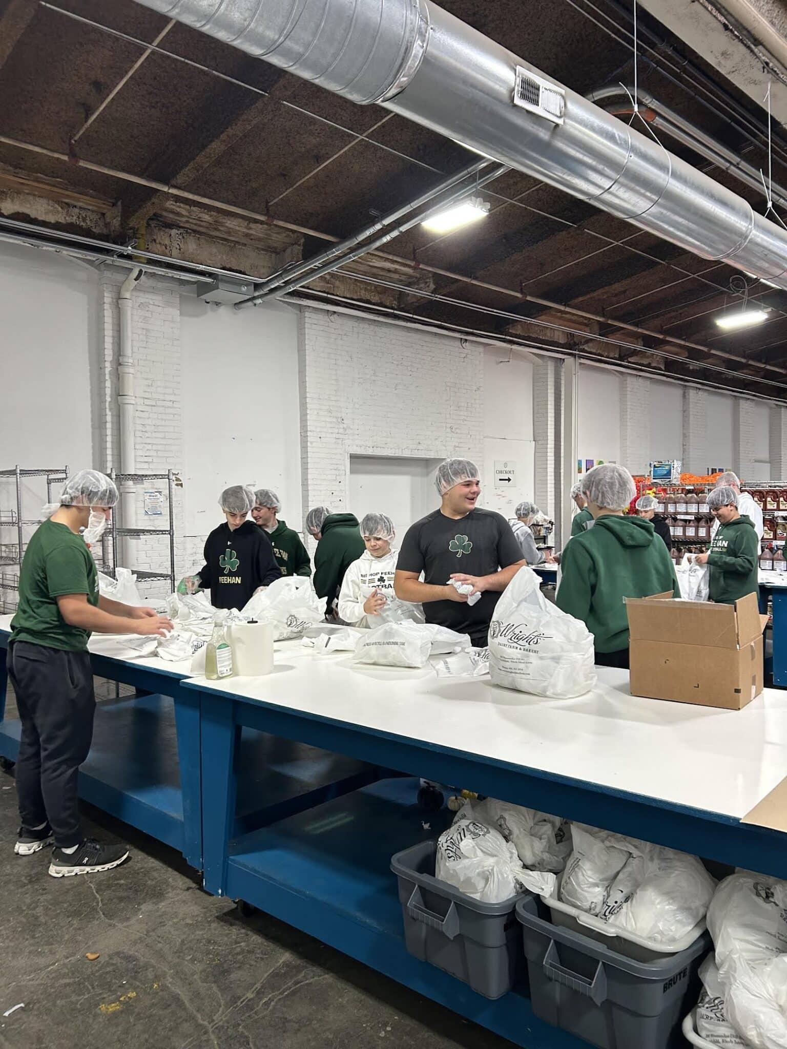 Feehan Freshman Football Honors Veterans Through Service, Packing 4,000 ...